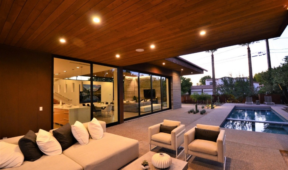 Pre-finished cedar wood ceilings and soffits add warmth to this modern ...