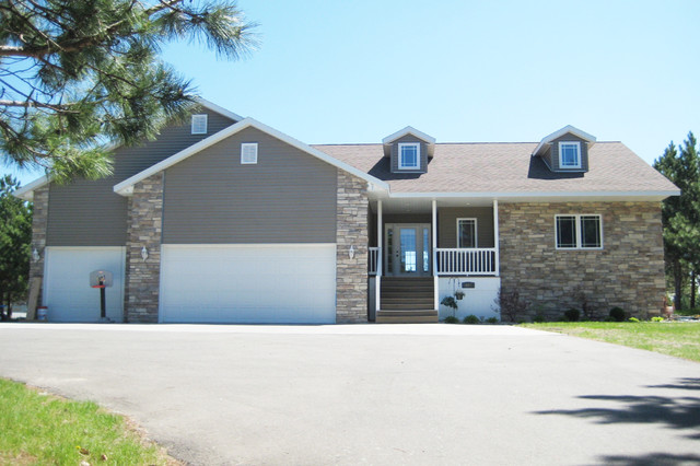 Ranch-style Home with 3-stall garage - Traditional - Exterior - Other ...