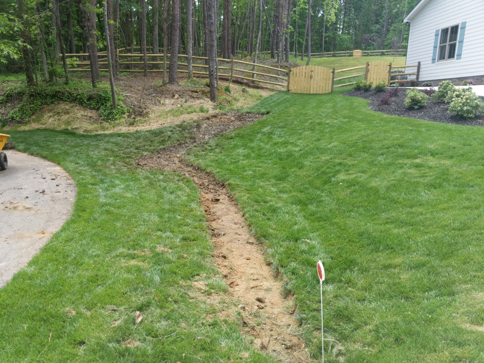 River Rock Drainage - Landscape - Charlotte - by Hyde's Lawn Care | Houzz