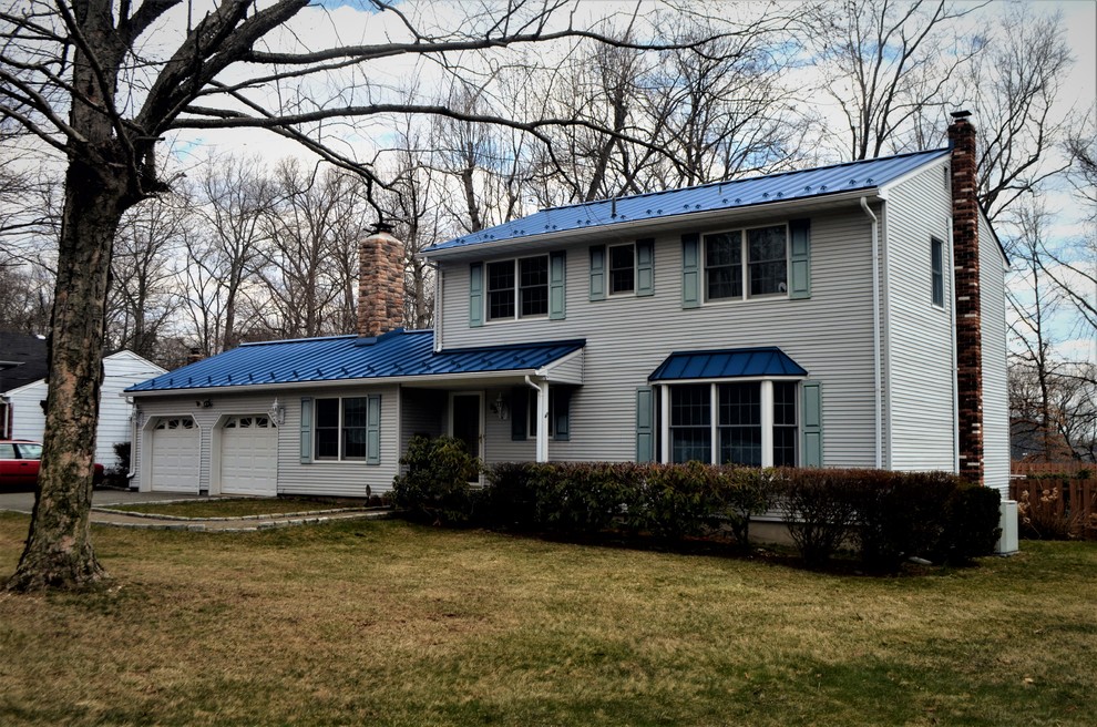 Royal Blue Standing Seam Metal Roof with Snow Guards Installation in ...