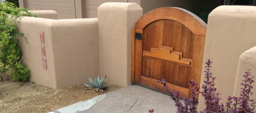 Spanish Style Home Design with Wooden Gate & Dark Bronze Contemporary ...