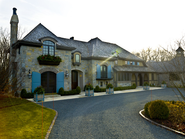 Stone and Stucco Old World Style House with Brick Accents - Traditional ...