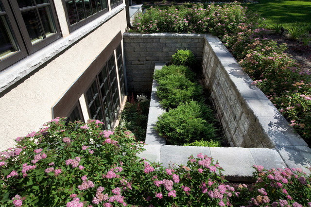 Stone Window Well Sheds Light into Basement - Traditional - House ...