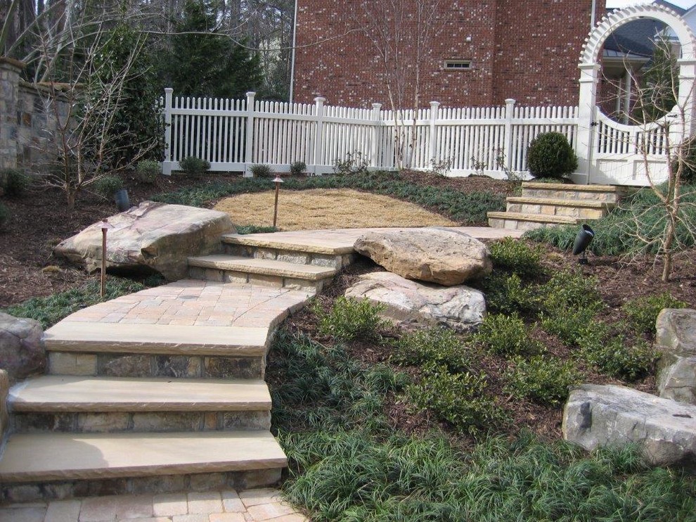 Paver landings and Fieldstone step treads with Arbor and Boulders ...