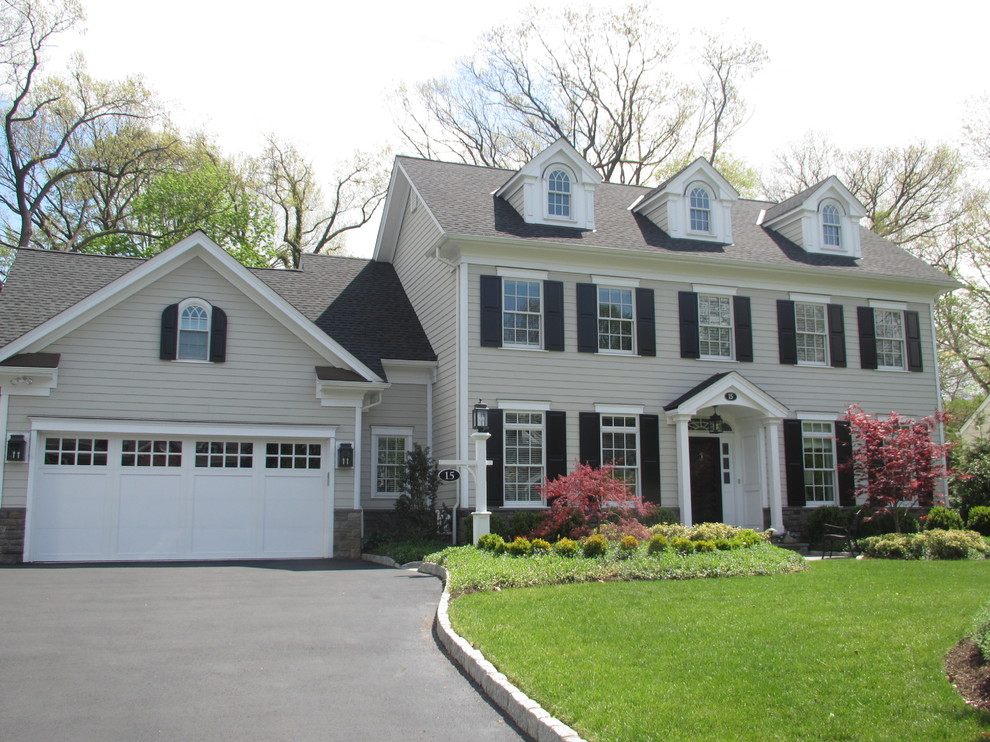 Transitional Colonial Home Exterior with Symmetrical Facade ...