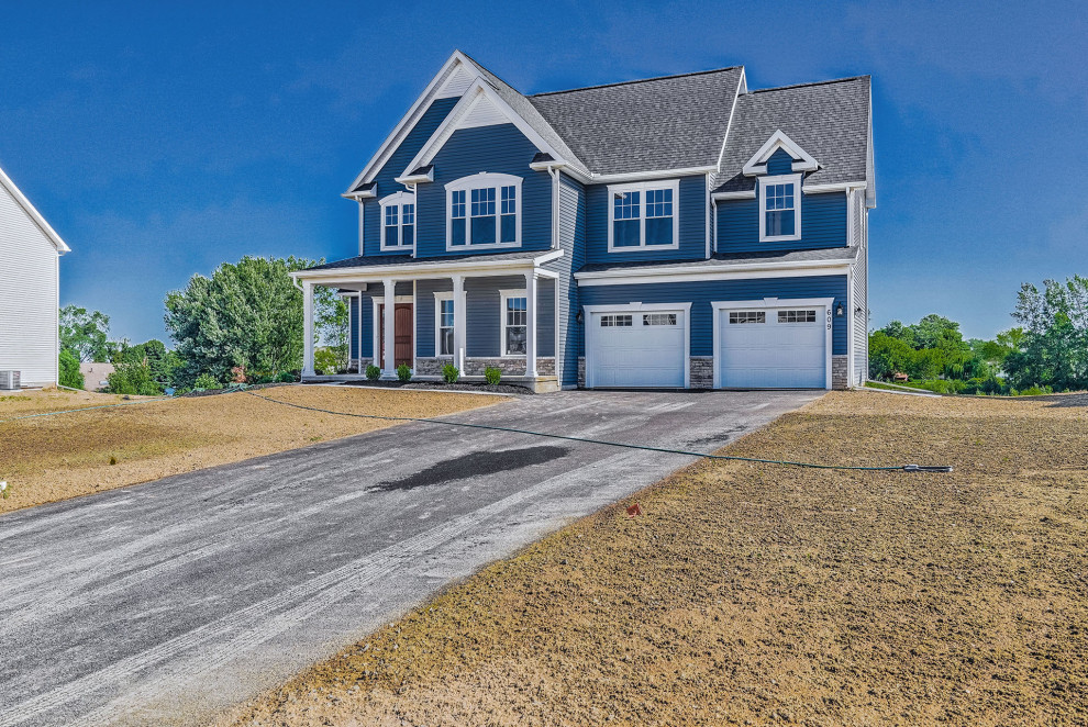 Two-Story Family Home at 609 Autumn Breeze Lane - Country - House ...