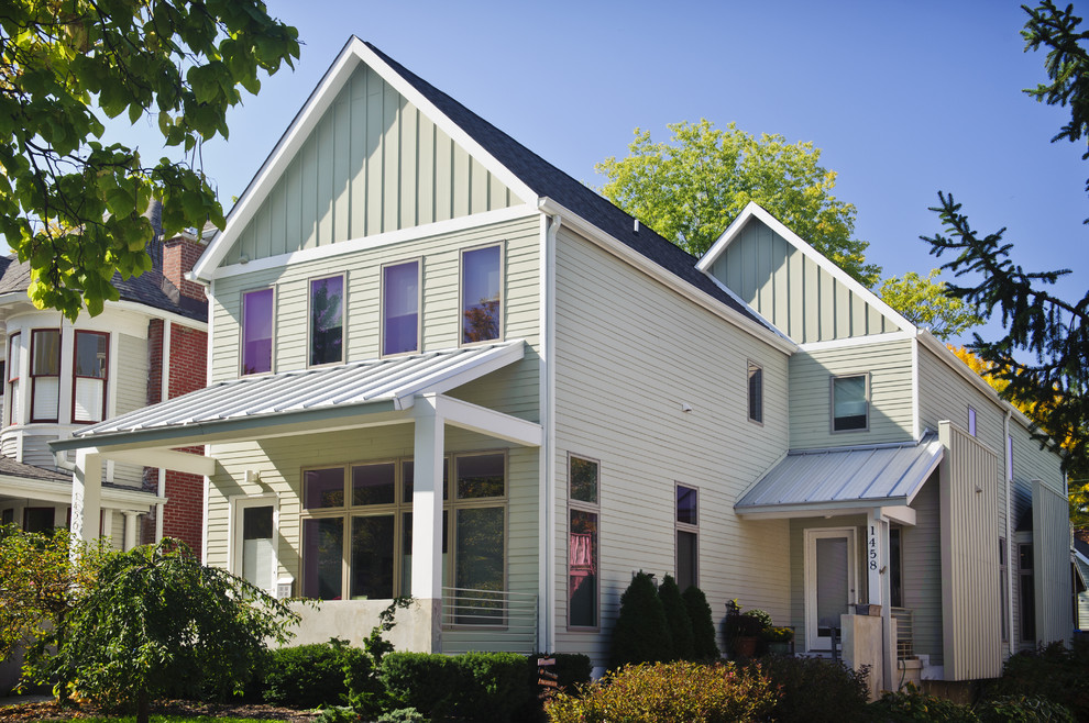 Urban two story home with contemporary details, metal roof & concrete ...