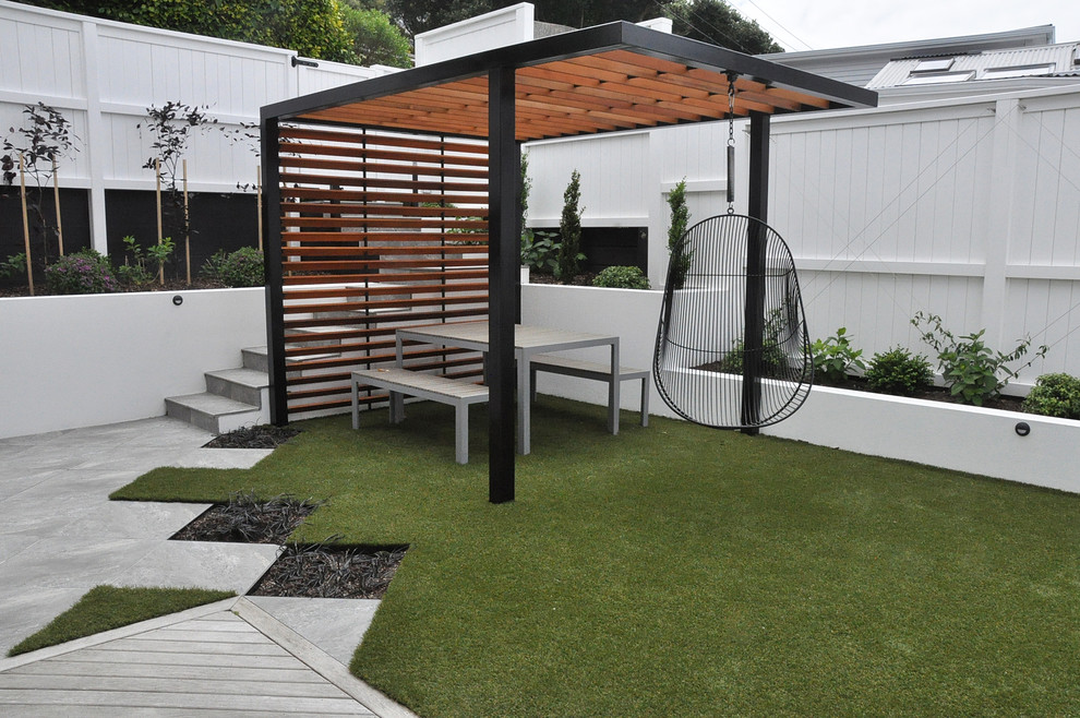 View of pergola, lawn and patio with hanging chair - Contemporary ...