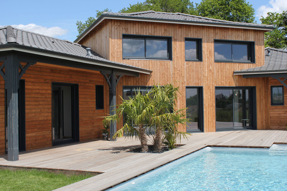 Une villa ossature bois spacieuse et confortable - Contemporáneo ...