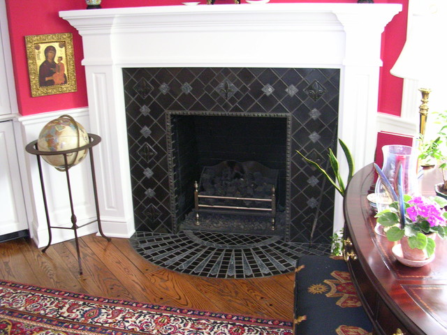 Custom fireplace with fleur de lis and diamond shape tile inserts ...