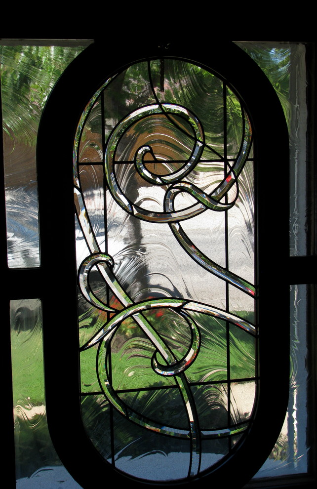 Operable oval wood & art-glass window - Traditional - Family Room - Los ...