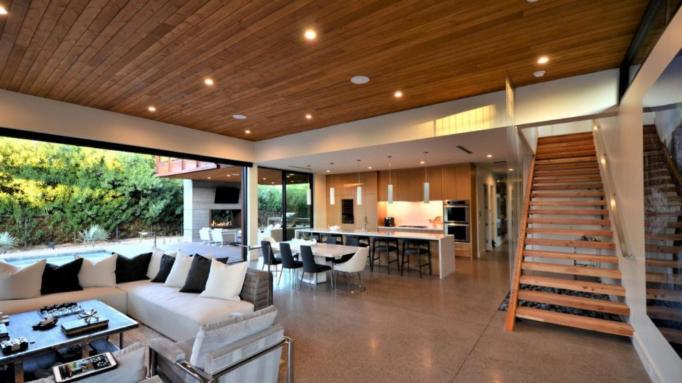 Pre-finished cedar wood ceilings and soffits add warmth to this modern ...