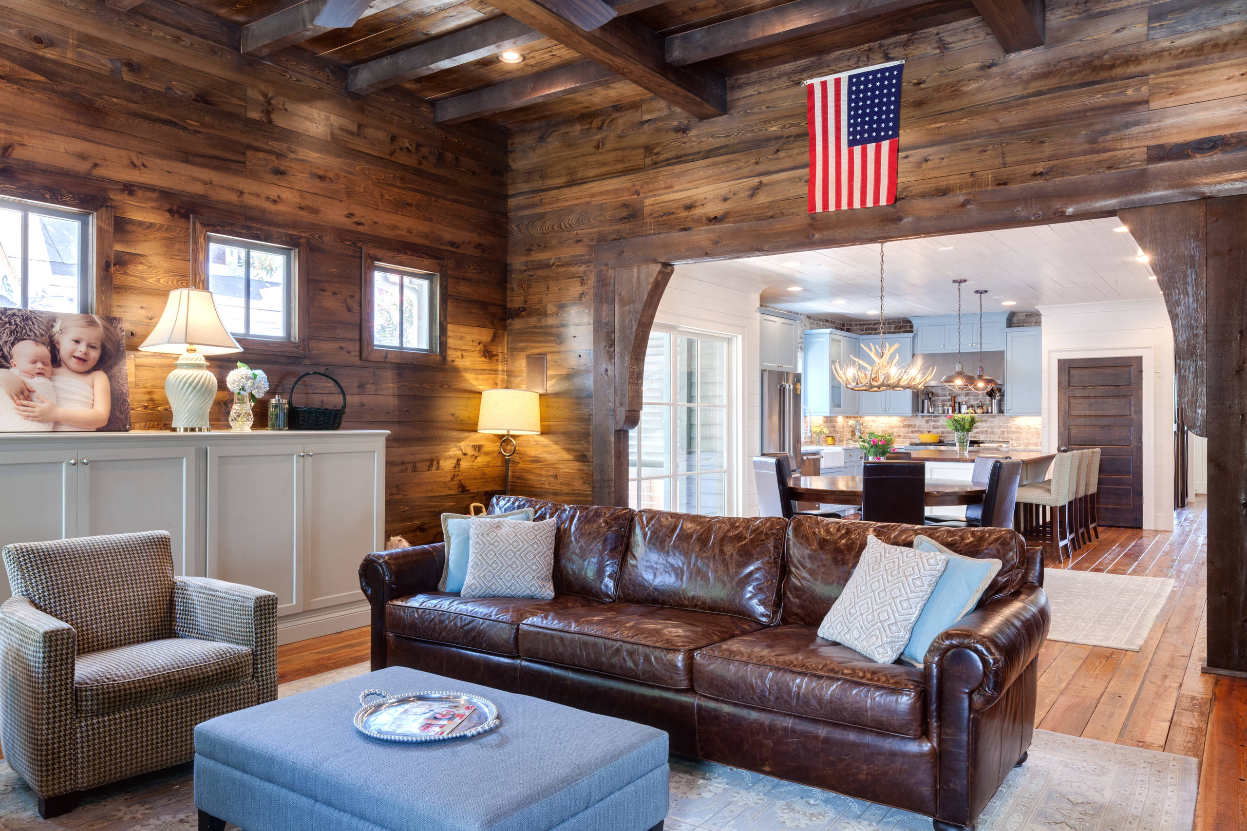 Farmhouse living room with brown couch store
