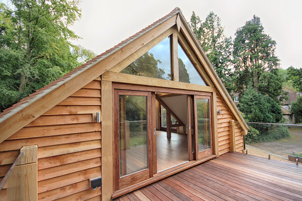 A closer look at the oak and glass balcony - Traditional - Garage ...