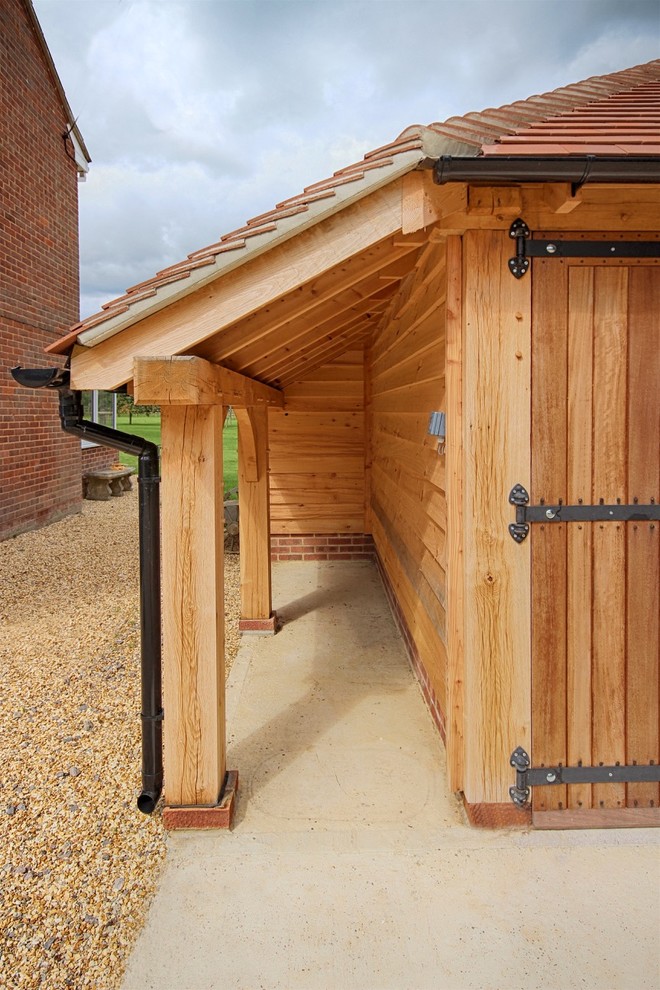 Classic Barn Outbuilding log store - Traditional - Garage - Hampshire ...