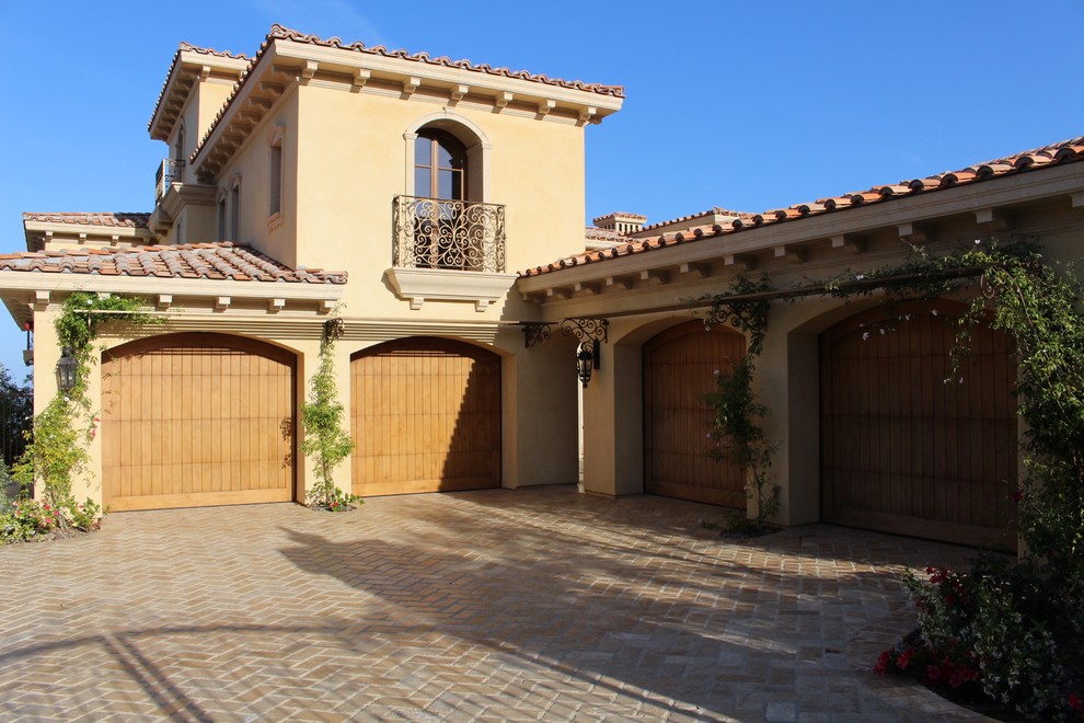 Custom Crafted Tuscan Style Garage Doors - Mediterranean - Garage ...