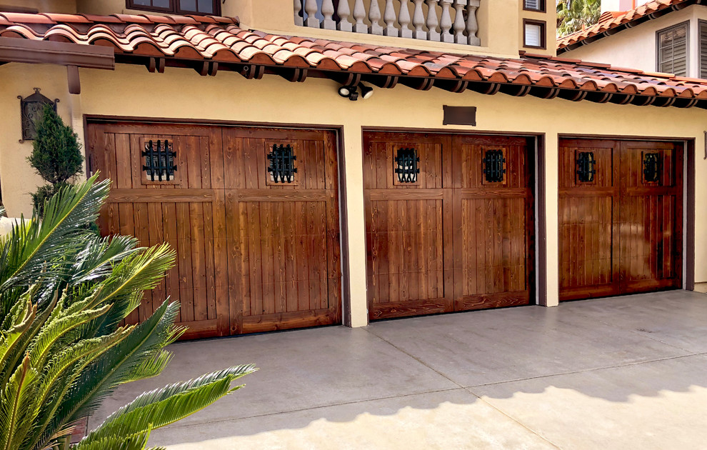 Mediterranean Wood Garage Doors with Iron Accessories - Mediterranean ...