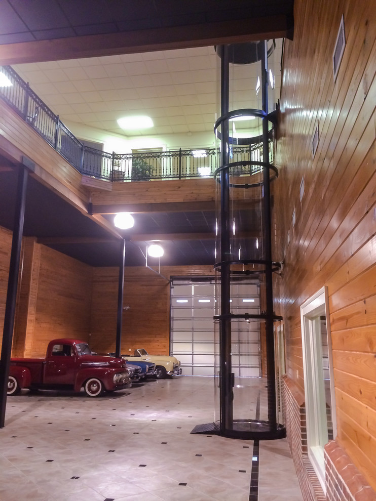 Savaria Vuelift Home elevator - Round - Garage - Rustic - Garage - by ...