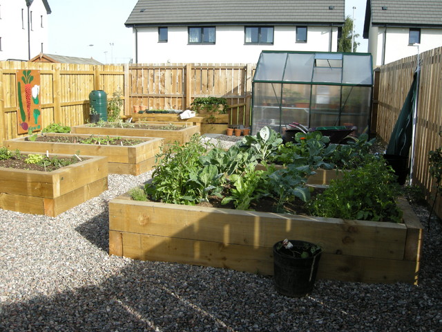 Community project building raised timber planters. - Traditional ...