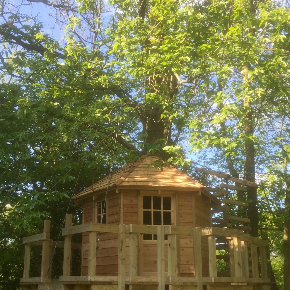 Log Rope Bridge leading to a 'floating' suspended treehouse - Rustic ...