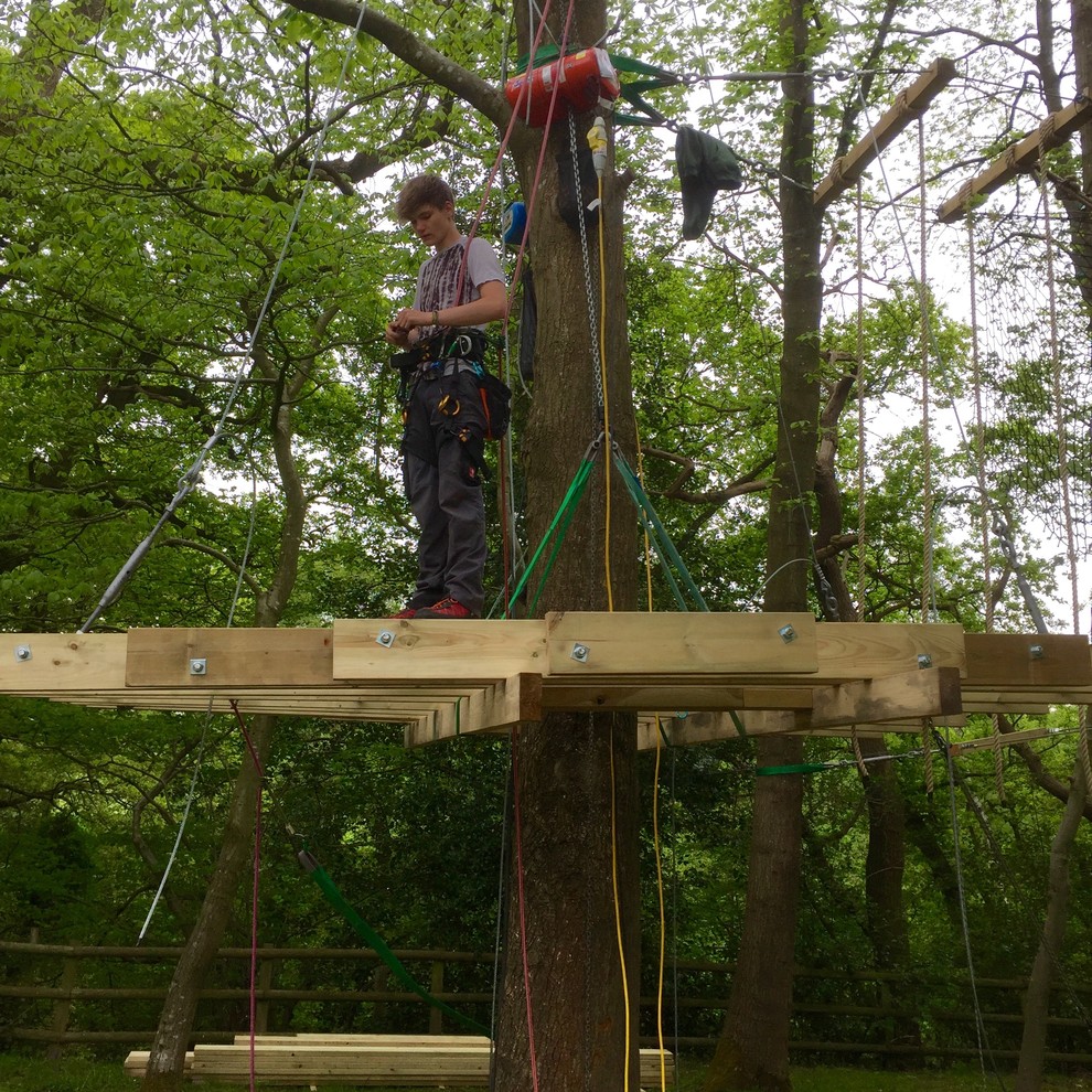 Log Rope Bridge leading to a 'floating' suspended treehouse - Rustic ...