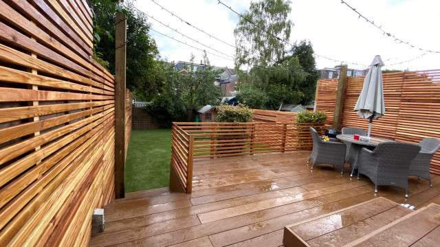 Millboard deck, artificial grass and cedar slat fencing in Reigate ...