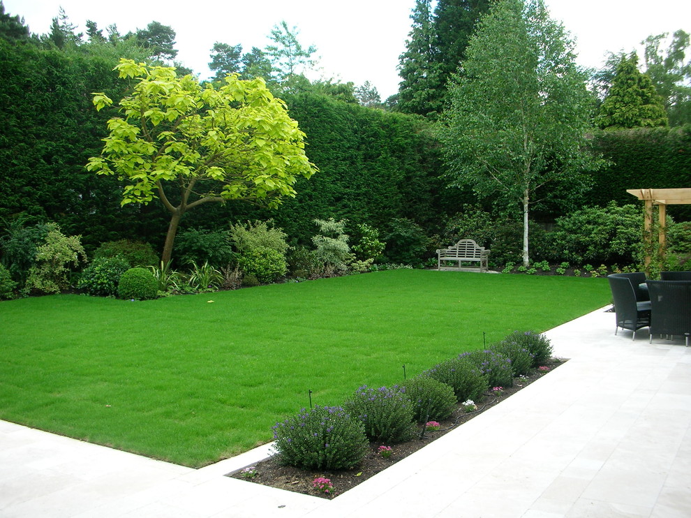 Modern country house terrace and garden - Modern - Landscape ...