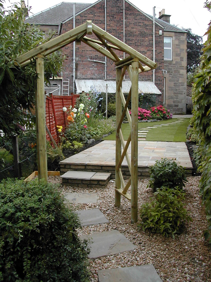 Rustic arch over stepping stone path. - Traditional - Landscape - Other ...