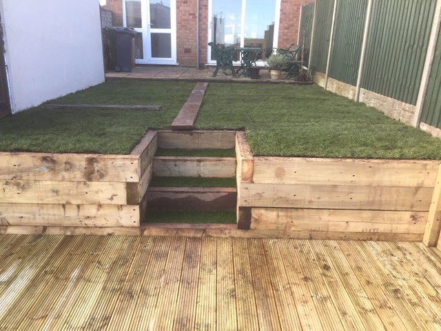 Sleeper wall with decking - Garden - West Midlands - by Creations ...