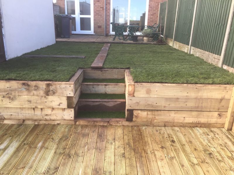 Sleeper wall with decking - Landscape - West Midlands - by Creations ...