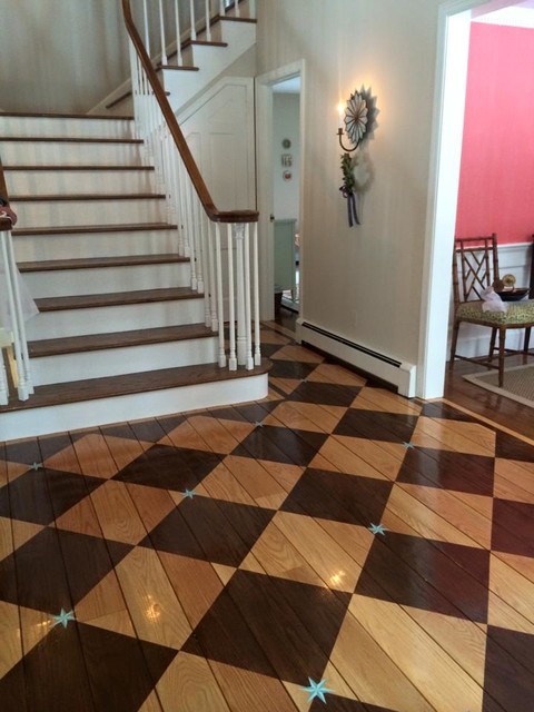 Foyer checkerboard stained floor with hand painted blue accent stars ...