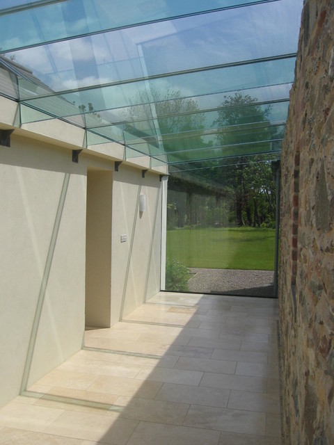 Hilltop stone farm buildings converted and extended to form modern ...