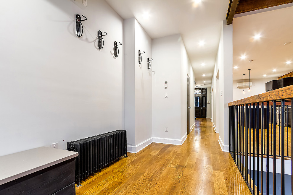 Industrial Design and Double-Height Space - Industrial - Hallway ...