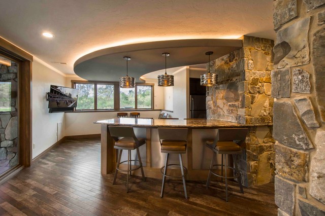 Curved Bar Seating under Curved Soffitt with Rustic Stone Accents ...