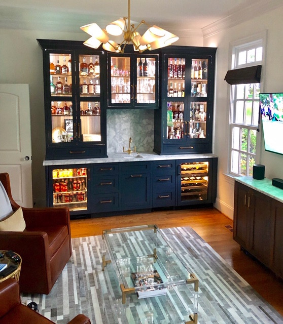 Masculine Bar with lighted glass cabinets - Transitional - Home Bar ...