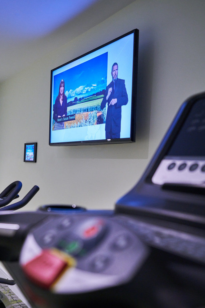 Entertainment screen in residents' gym - Modern - Home Gym - Berkshire ...