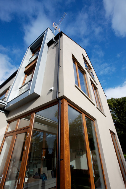 Collection of four contemporary Iroko timber clad modern family homes ...