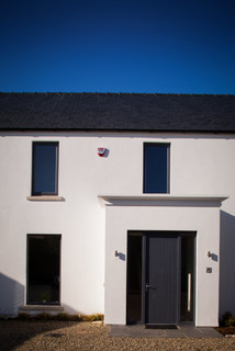 Modern Home with Traditional Farmstead Form - Farmhouse - Exterior ...