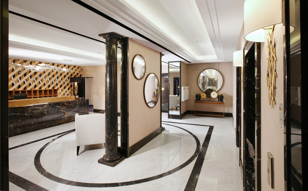 Marble inlaid wall tiles for lobby designs | Condo Lobby by Renovatio ...