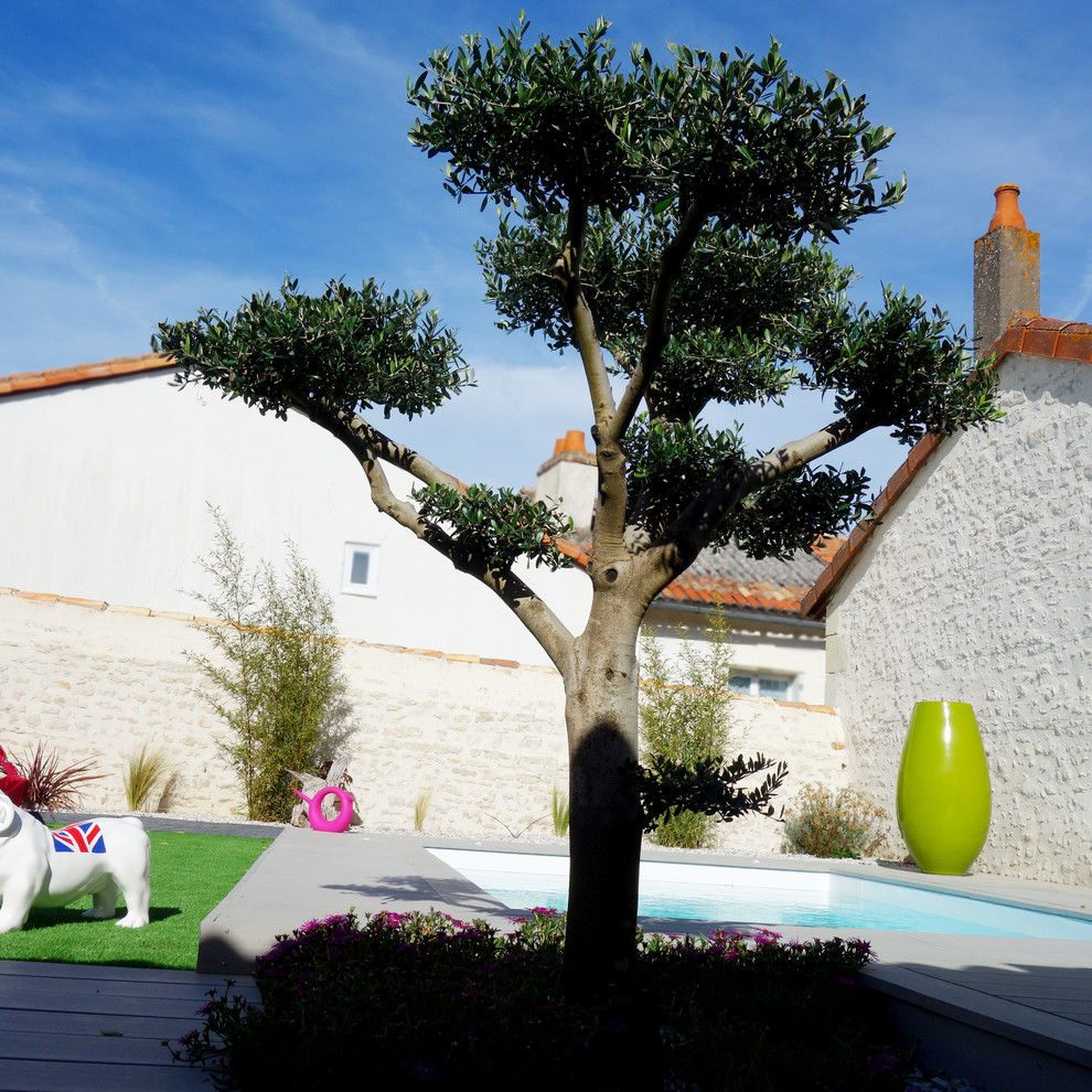 Aménagement d'un jardin avec terrasse bois et gazon synthètique ...