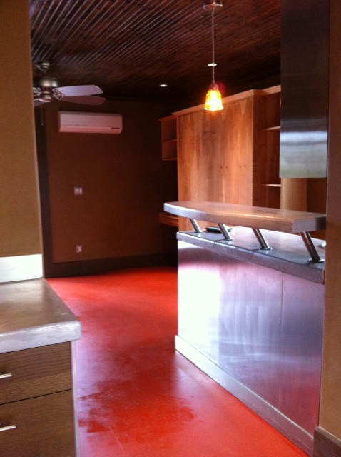 2-car garage converted into a swanky studio apartment with a Murphy bed ...