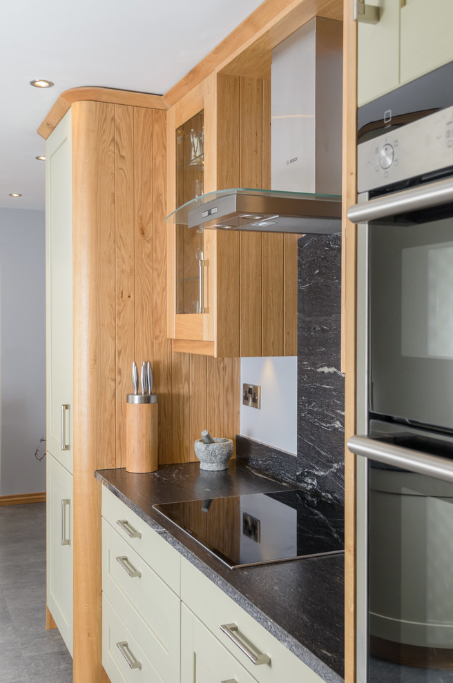 A touch of theatre for a traditional kitchen with sweeping curves and ...