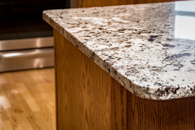 Alaska White Granite with Oak Cabinets Kitchen - Traditional - Kitchen ...