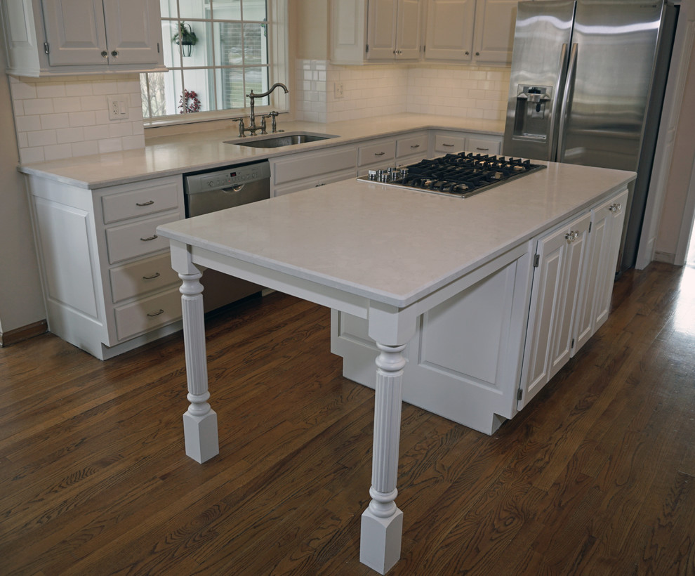 All white kitchen, countertops and backsplash - Traditional - Kitchen ...