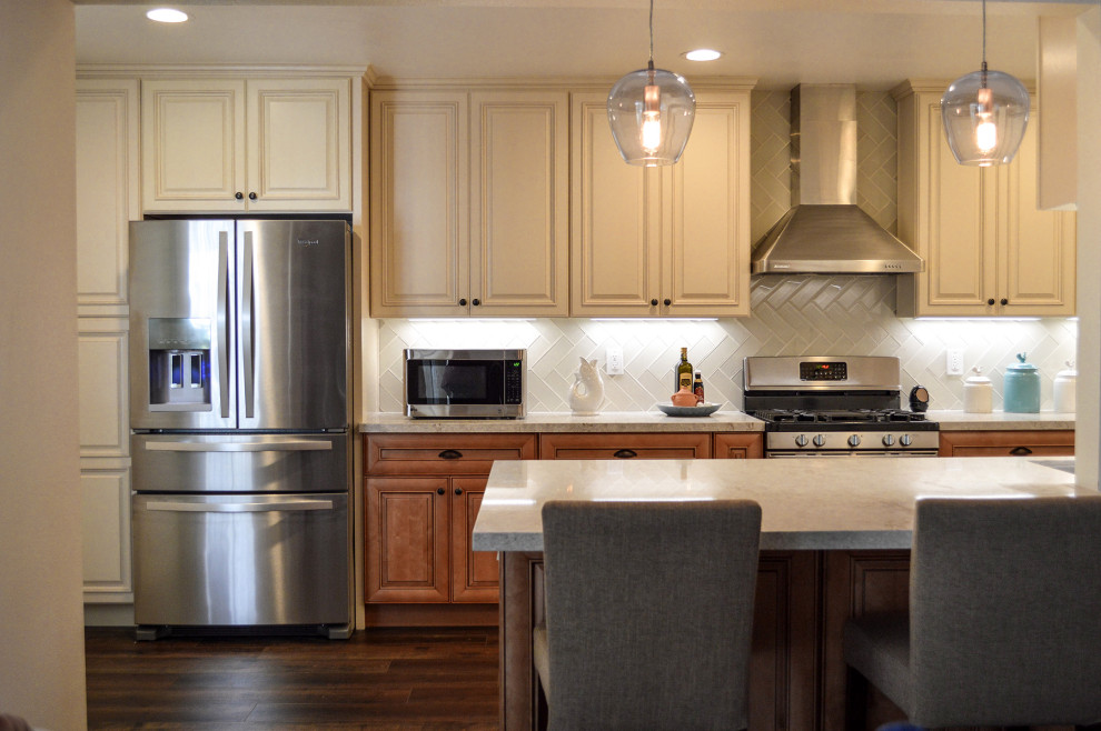Antique white kitchen upper cabinet with cinnamon cabinets and Quartz ...