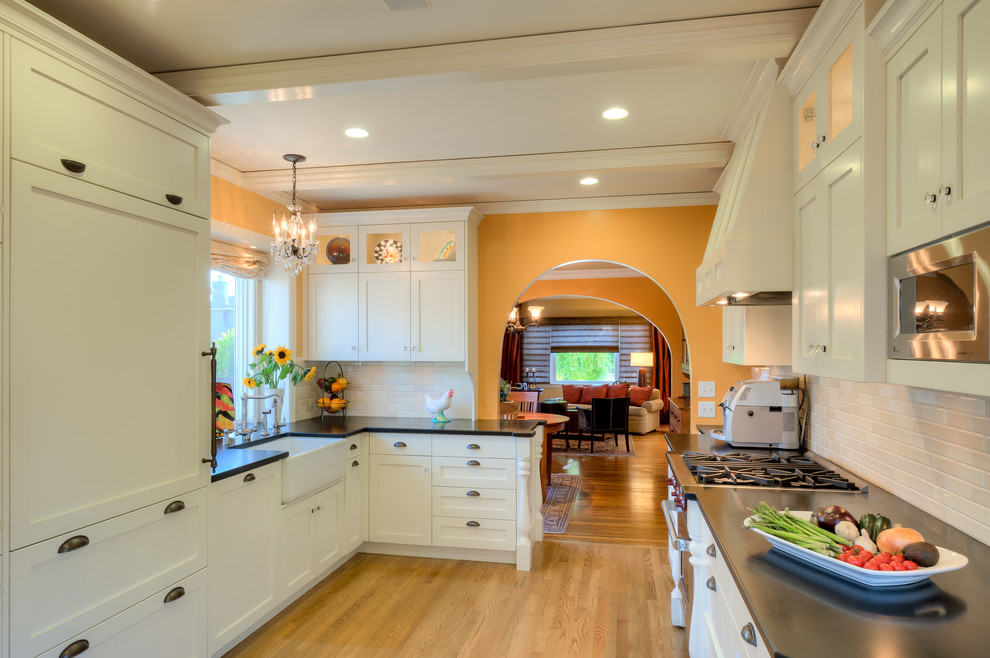 Arch doorway visually broadens kitchen entrance - Mediterranean ...