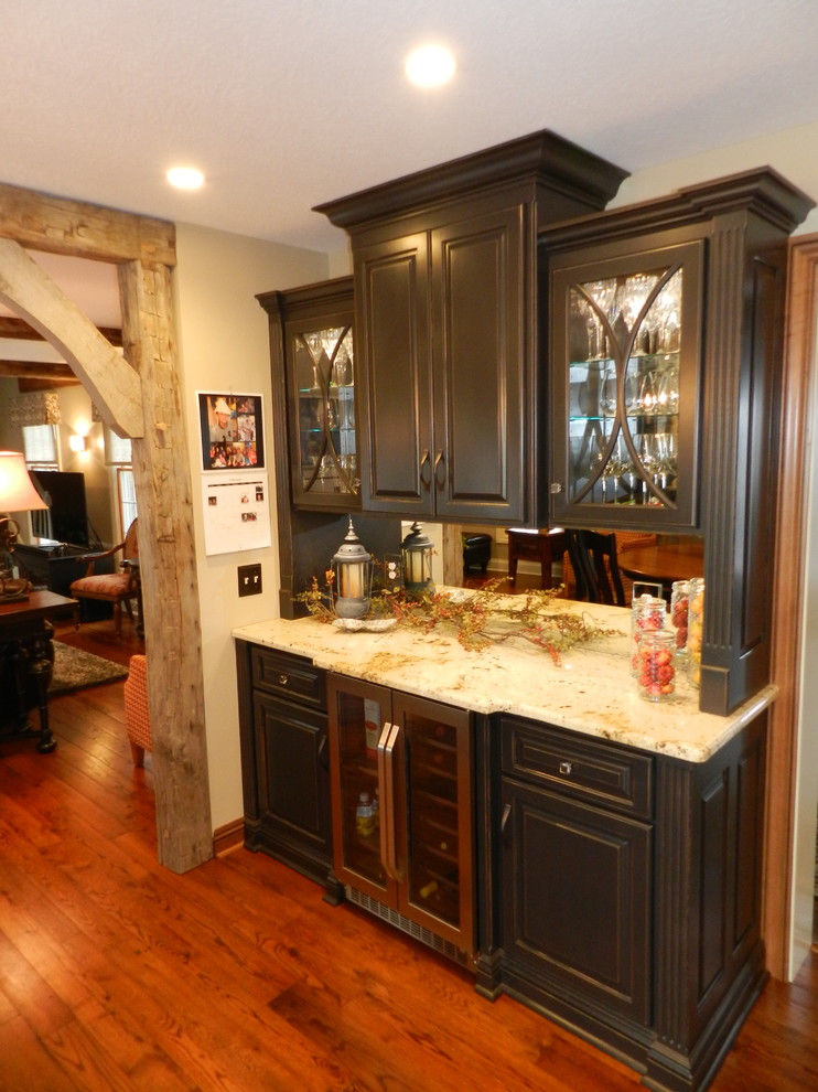 Black accent beverage center with curved mullions - Traditional ...