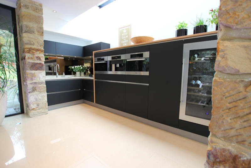 Black matt handleless kitchen - Modern - Kitchen - London - by LWK ...