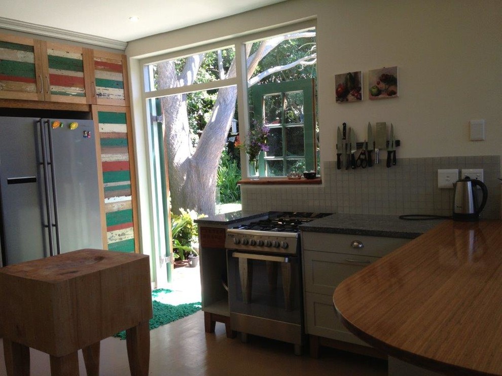 butcher block, granite and bamboo countertops with recycled cupboard ...