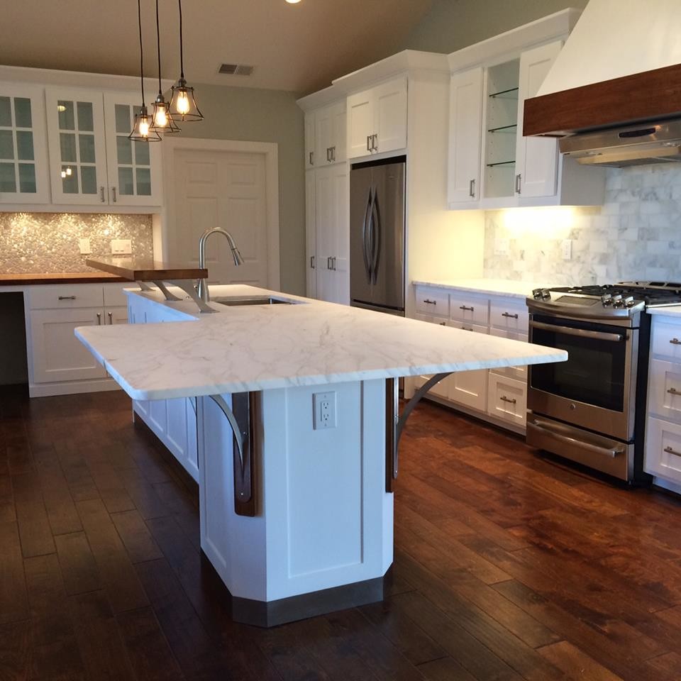 White Kitchens With Calcutta Marble